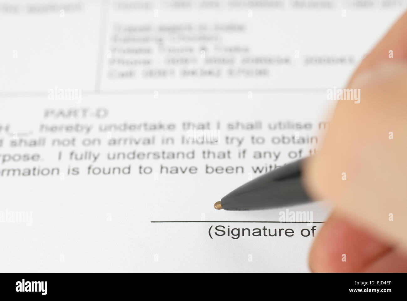 Pen signing contract Stock Photo - Alamy