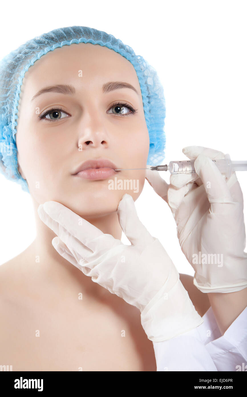 Beautiful woman gets an injection in her face close-up Stock Photo - Alamy