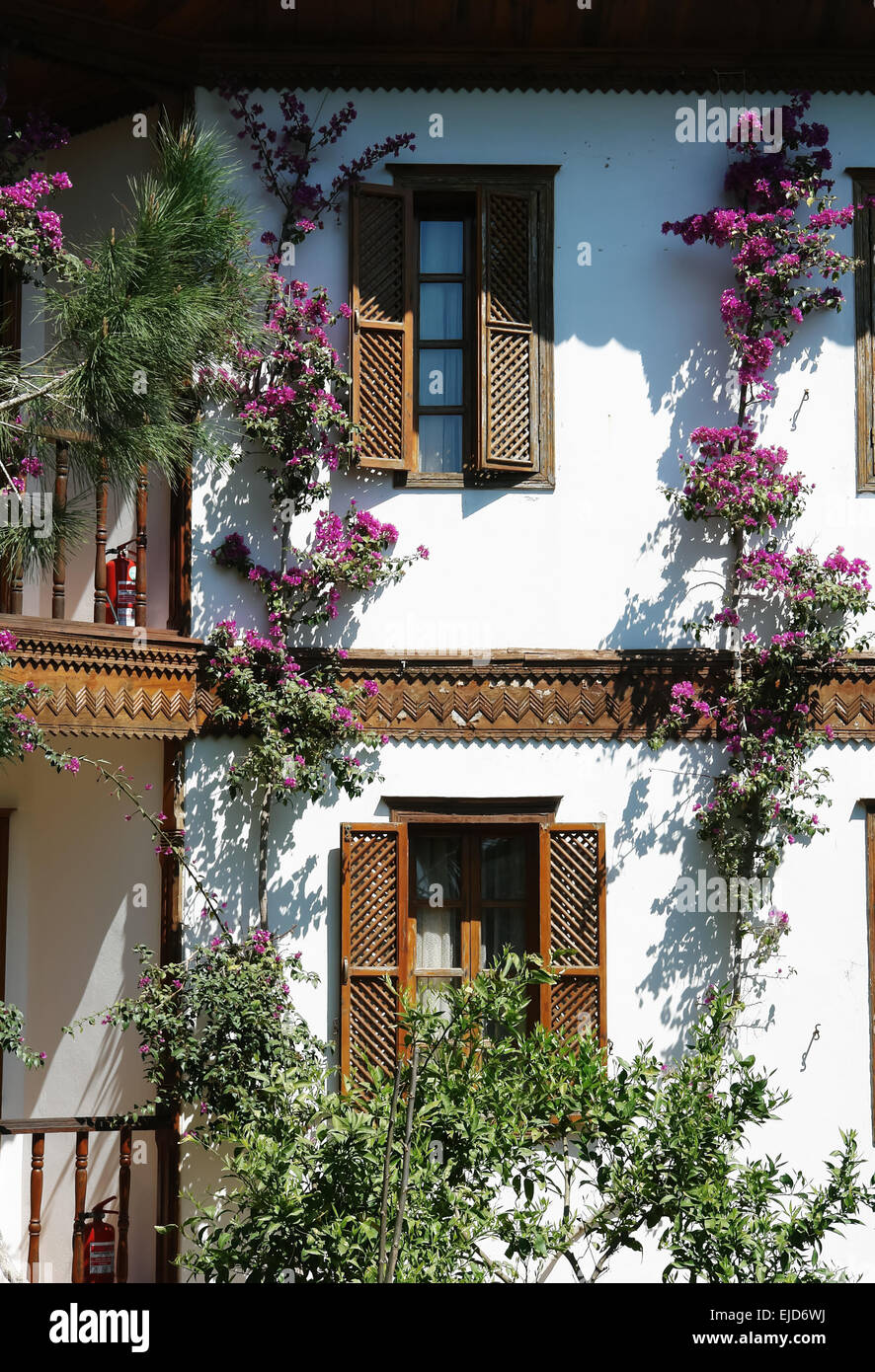 Terrace, windows and flowers of high class hotel in Mediterranean coast ...