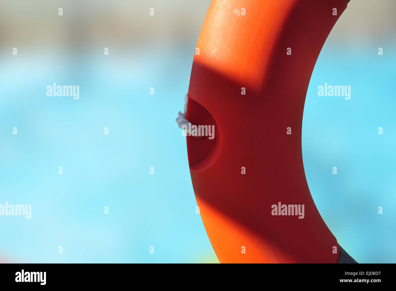 Lifebuoy closeup shot in swimming pool Stock Photo - Alamy