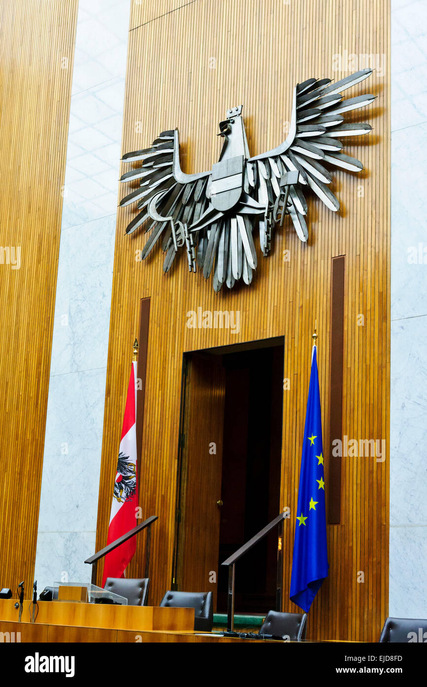 An eagle crest on the wooden wall in the National Council Chamber at ...