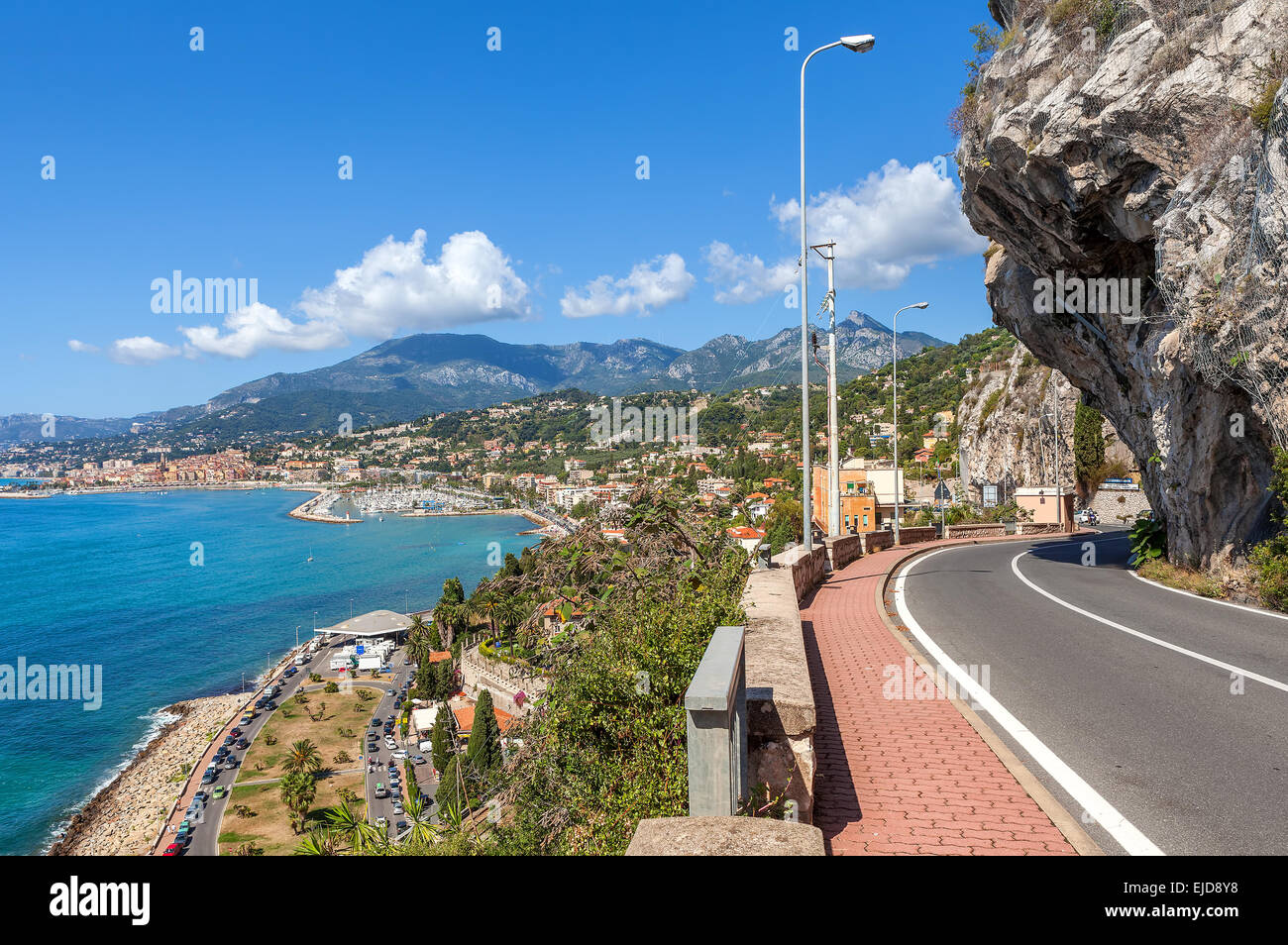 Scenic road under blue sky along Mediterranean sea coastline on French ...