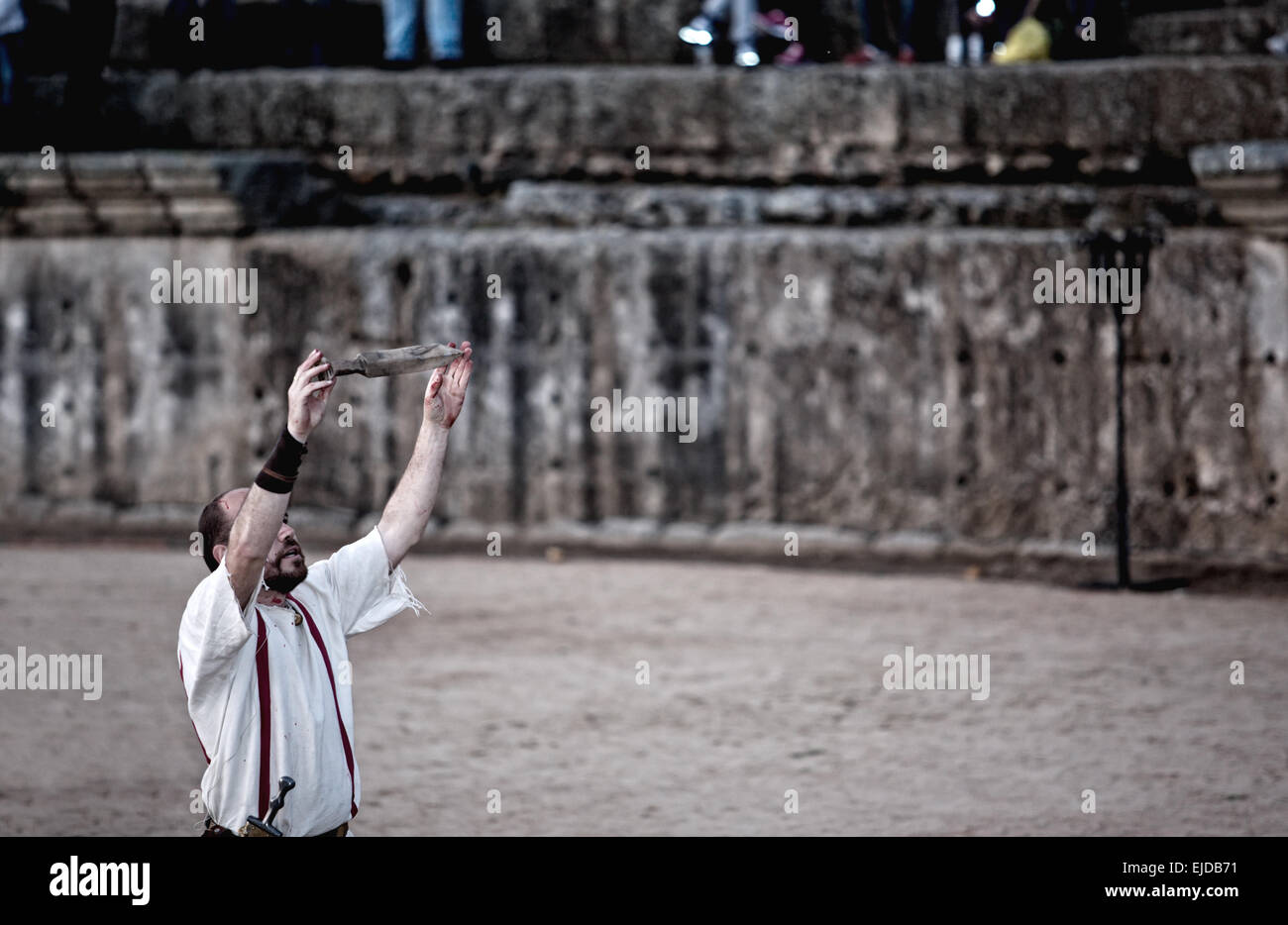 MERIDA, SPAIN – APRIL 5: performing of gladiators fighting of Merida's ...