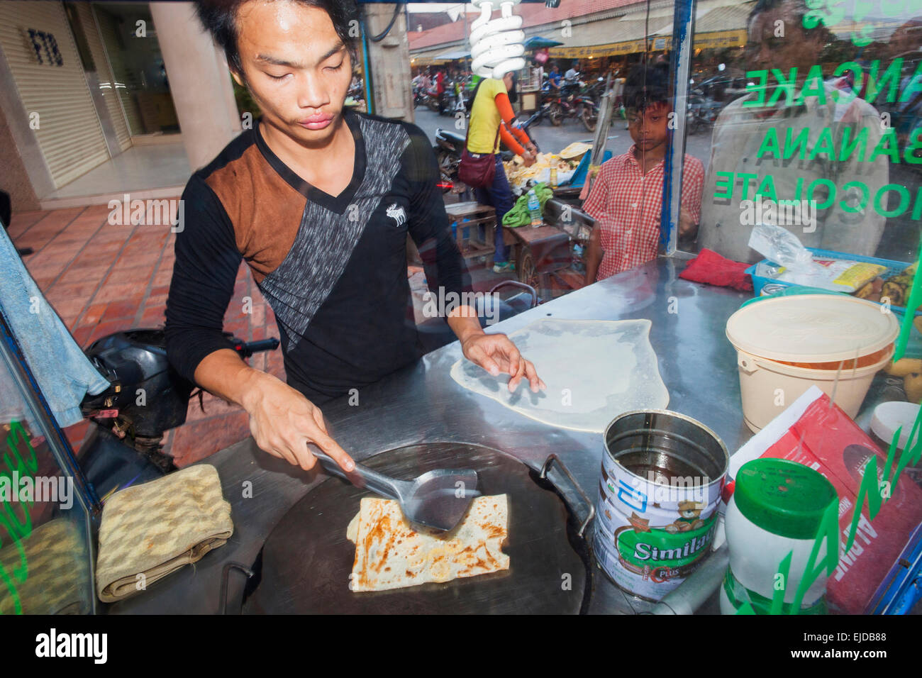 Man making crepes hi-res stock photography and images - Alamy