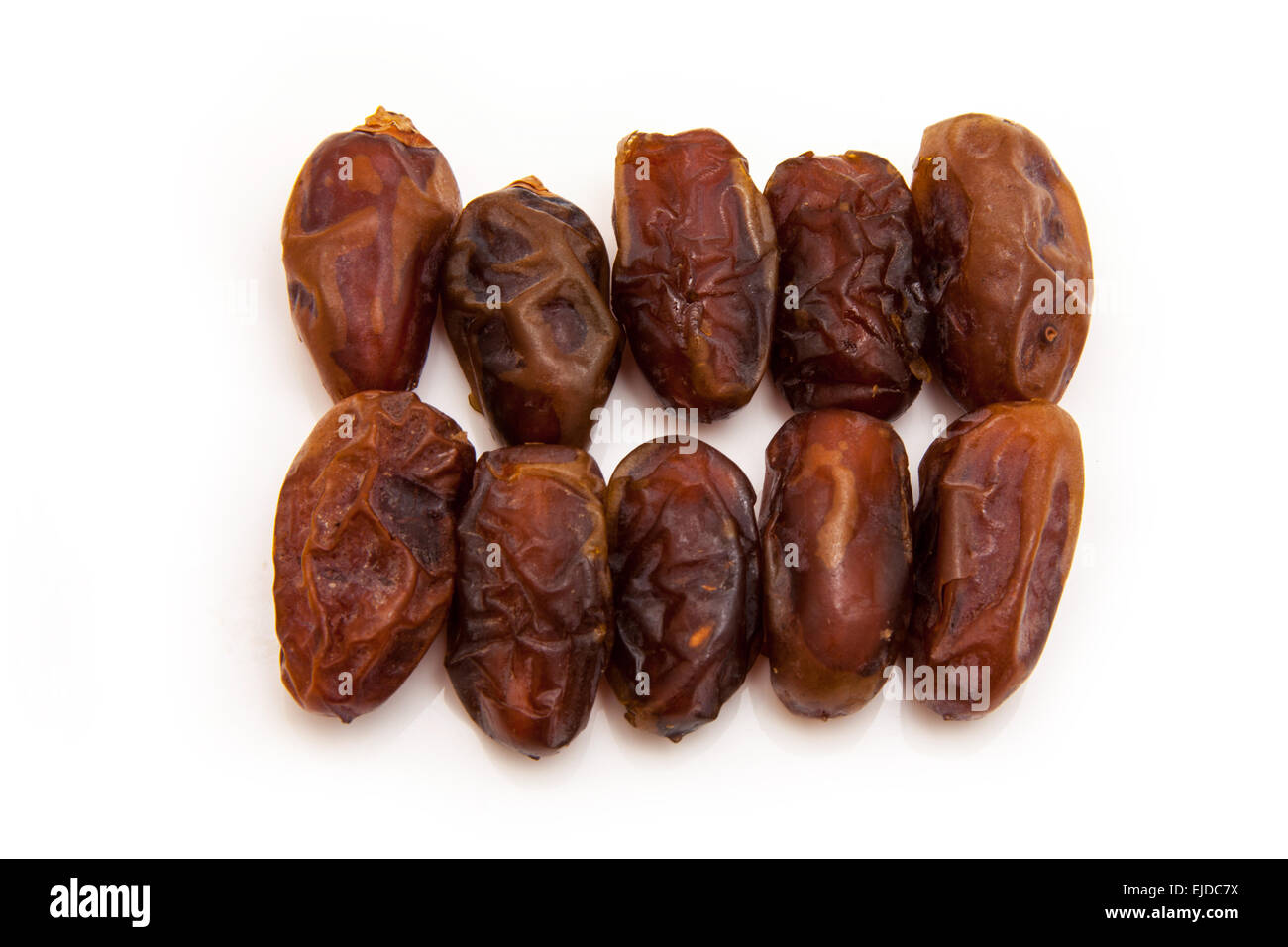 Halawi dates isolated on a white background. Halawi dates originate ...