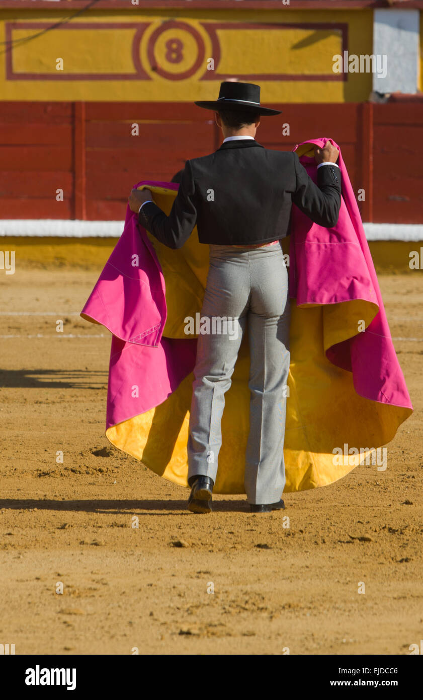 The bullfighter waits the bull with the capote during a bullfight in ...