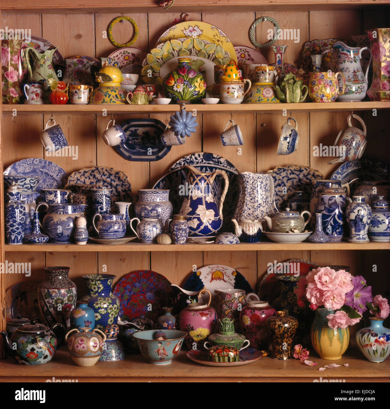 Collection of vintage china on wooden dresser Stock Photo - Alamy