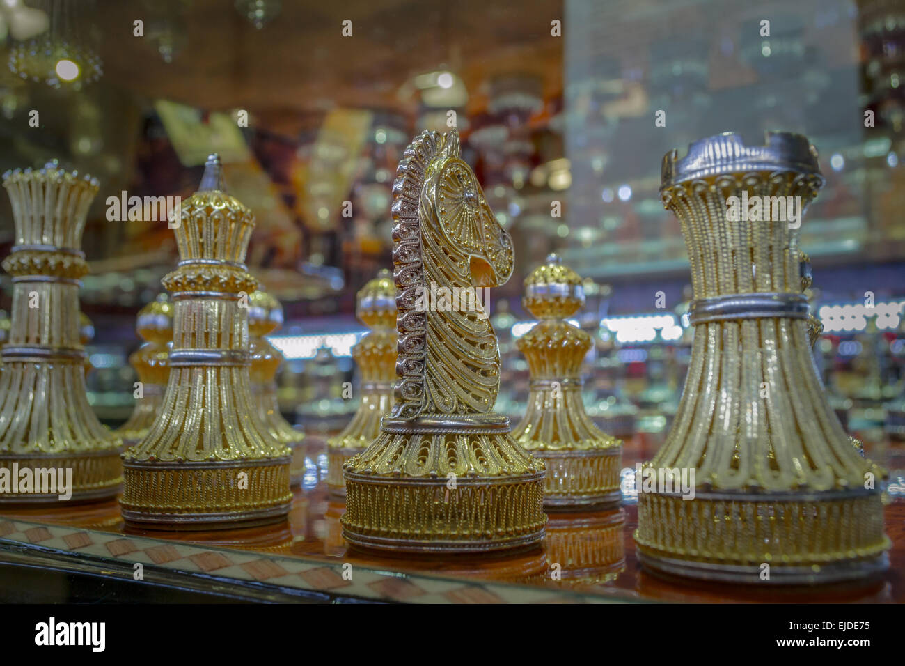 A luxury chess set of a Knight Rook Bishop and Queen encusted with gold ...