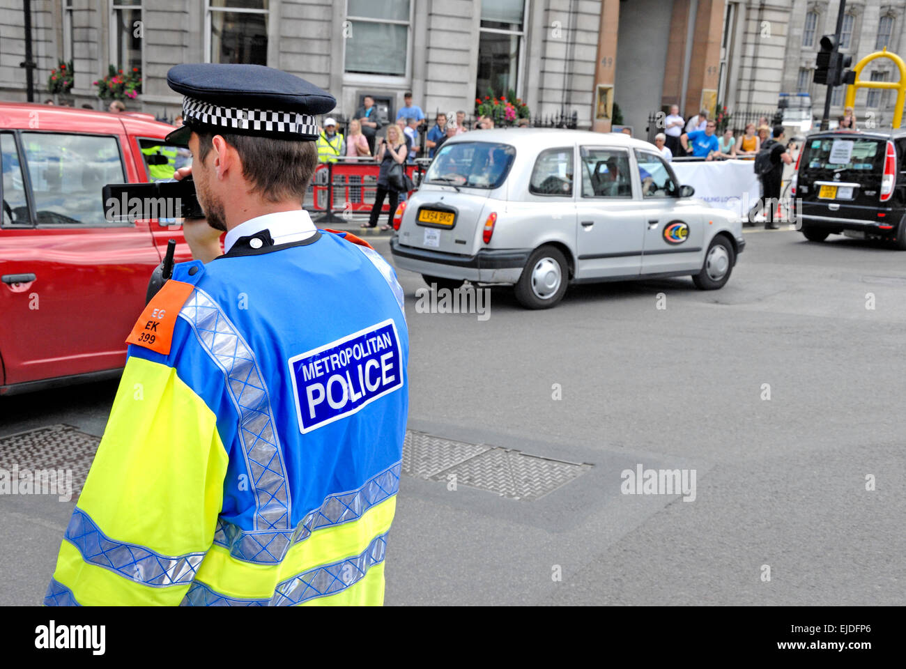 London, England, UK. Black cab drivers dispute, 2014. Police officer ...