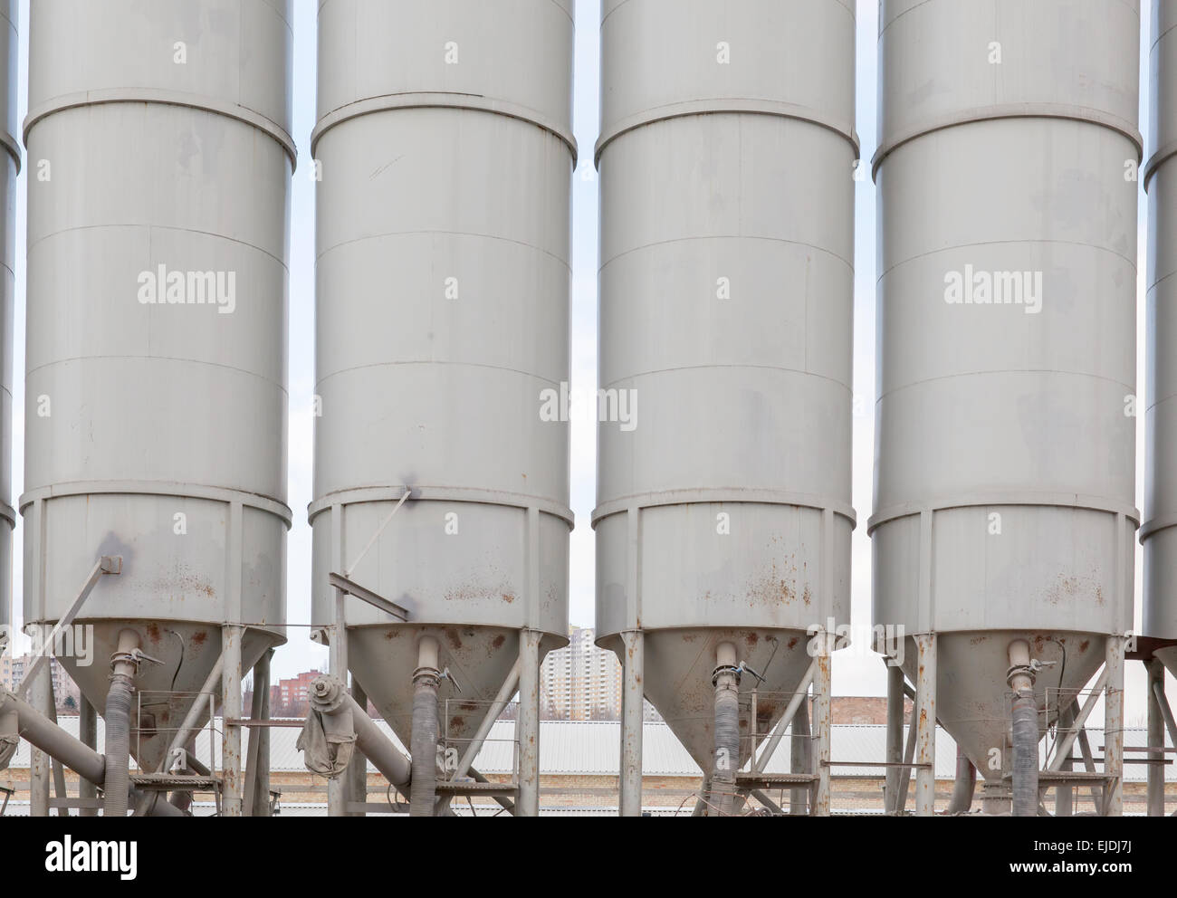 Group of production silos on the cement factory close up Stock Photo ...