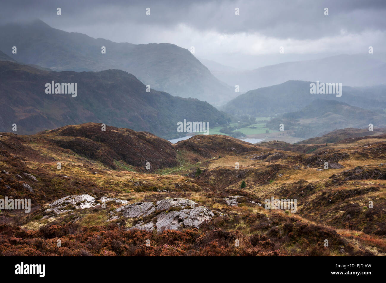 Dramatic rainy weather in Snowdonia. Rain falling on hills and ...