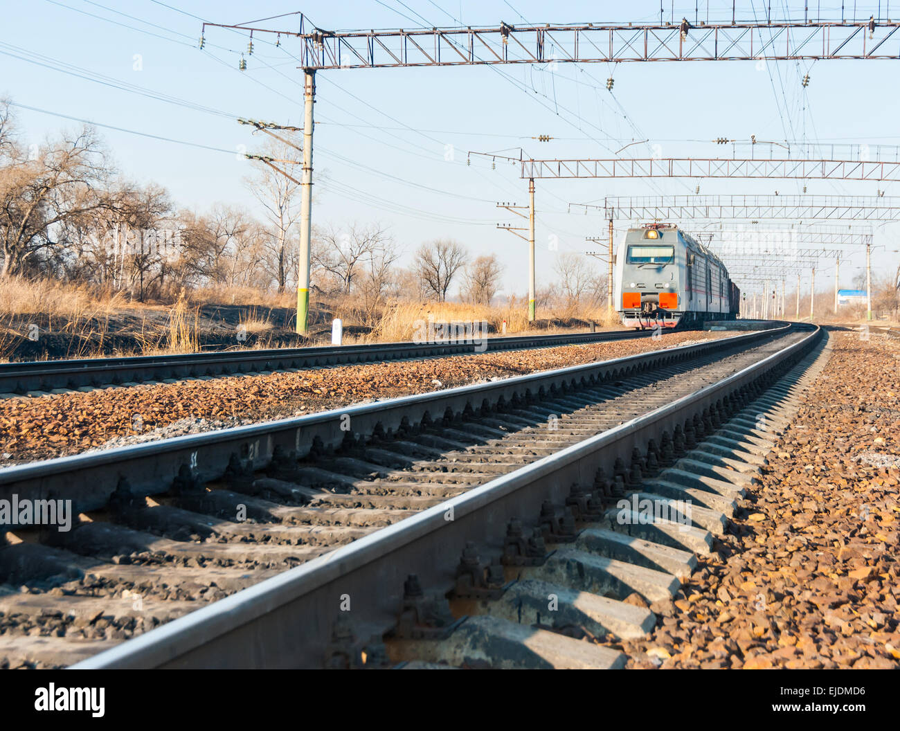 The train moves by rail Stock Photo - Alamy