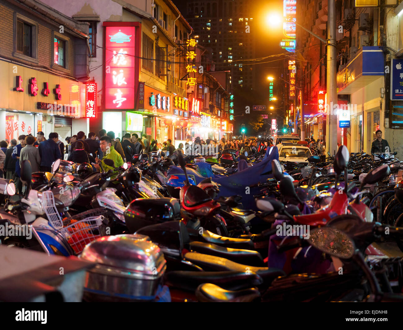 Motorcycles parked on a street in Shanghai, China Stock Photo - Alamy
