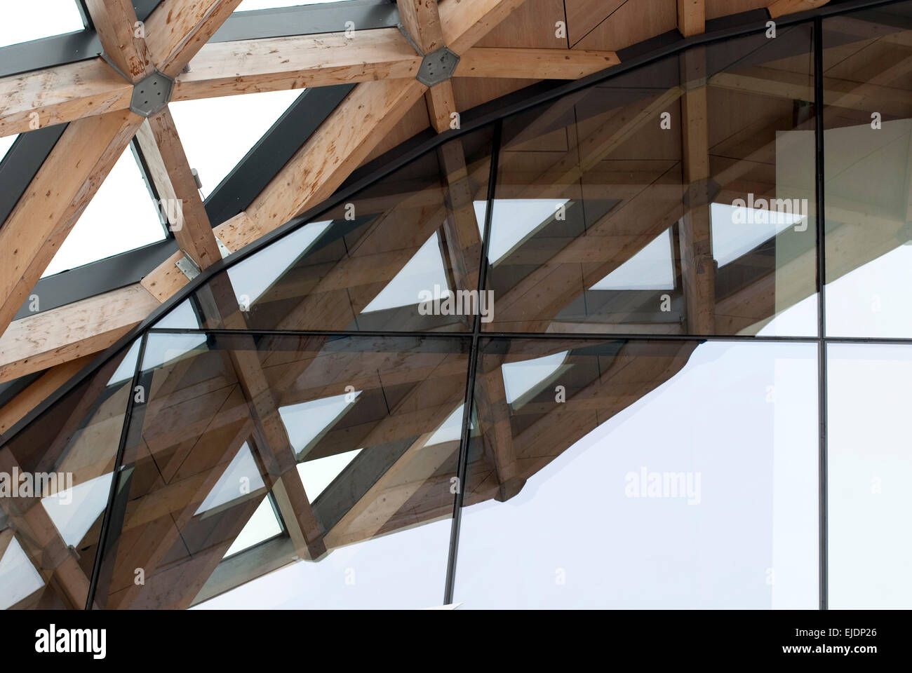 Image showing the contrast of wood and glass structure in the roof line ...