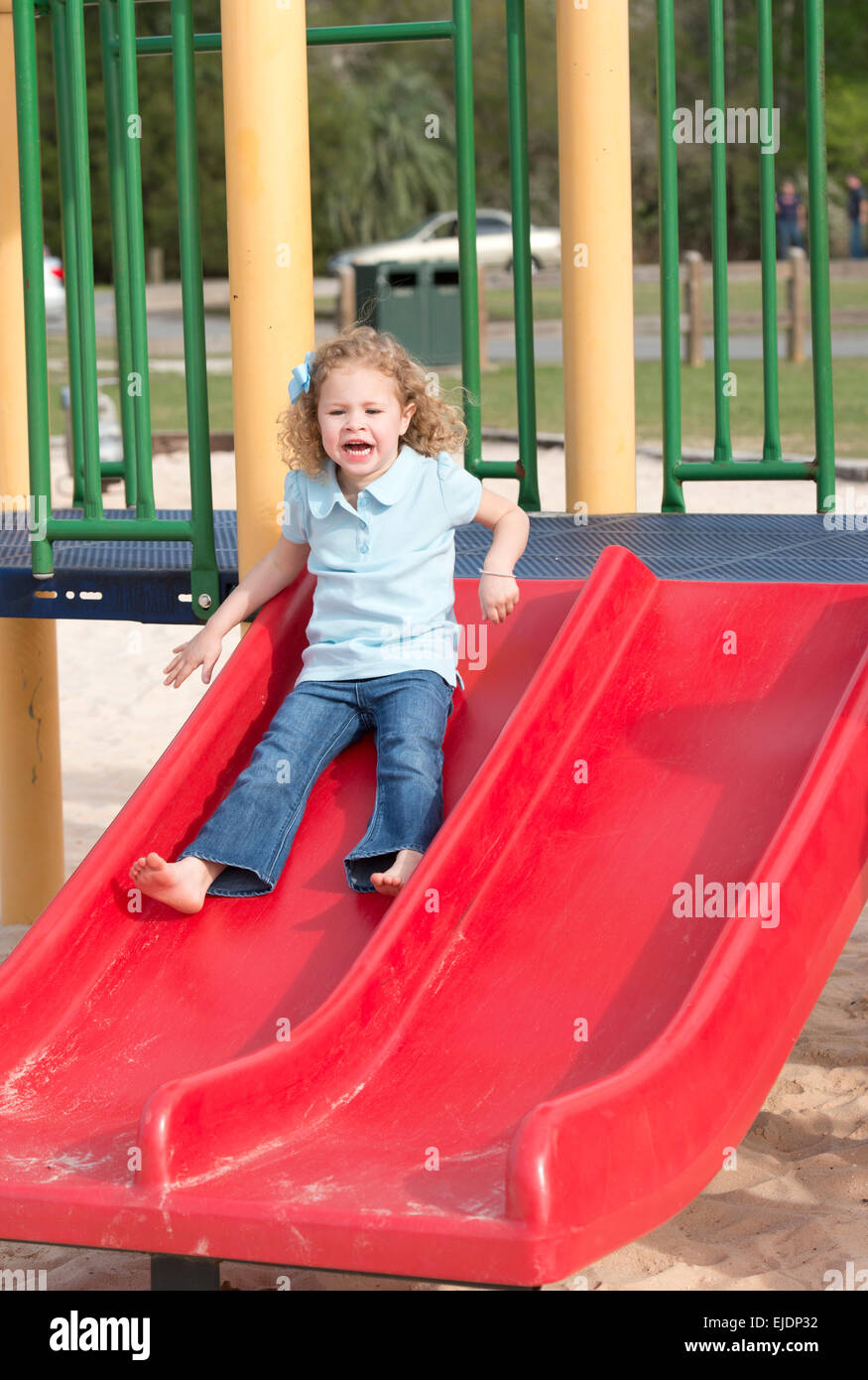 Blonde child slide hi-res stock photography and images - Alamy