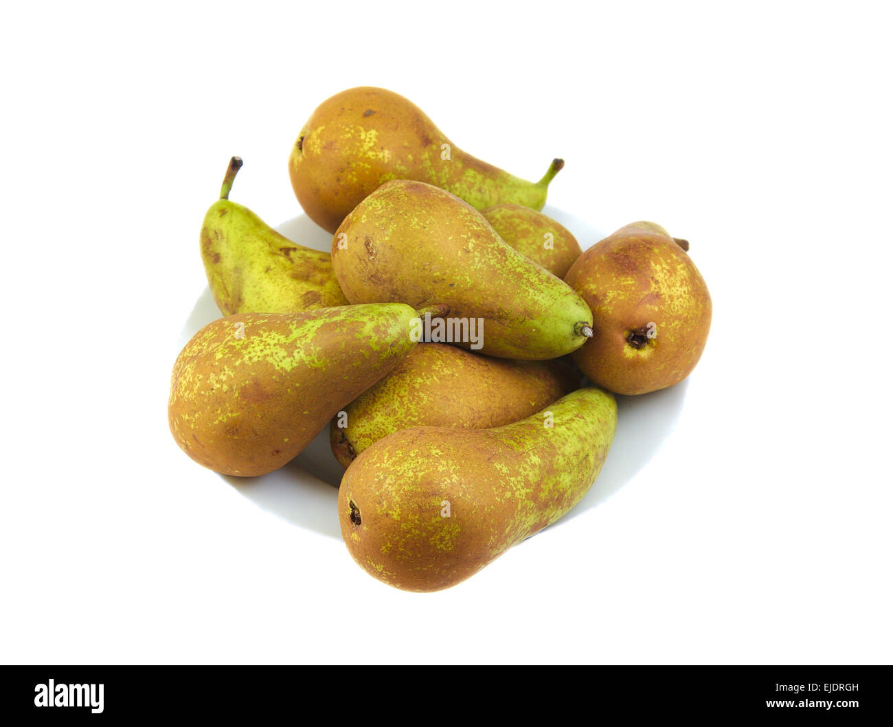 Small group of conference pears on white background Stock Photo - Alamy