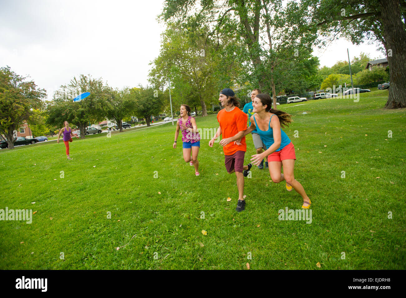 Group Playing Frisbee Stock Photo - Alamy
