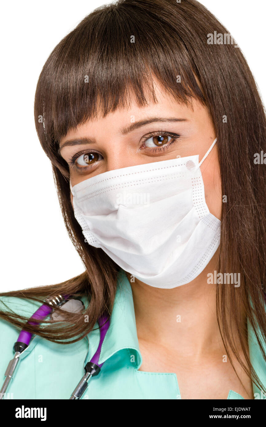 Female doctor wearing surgical mask Stock Photo - Alamy
