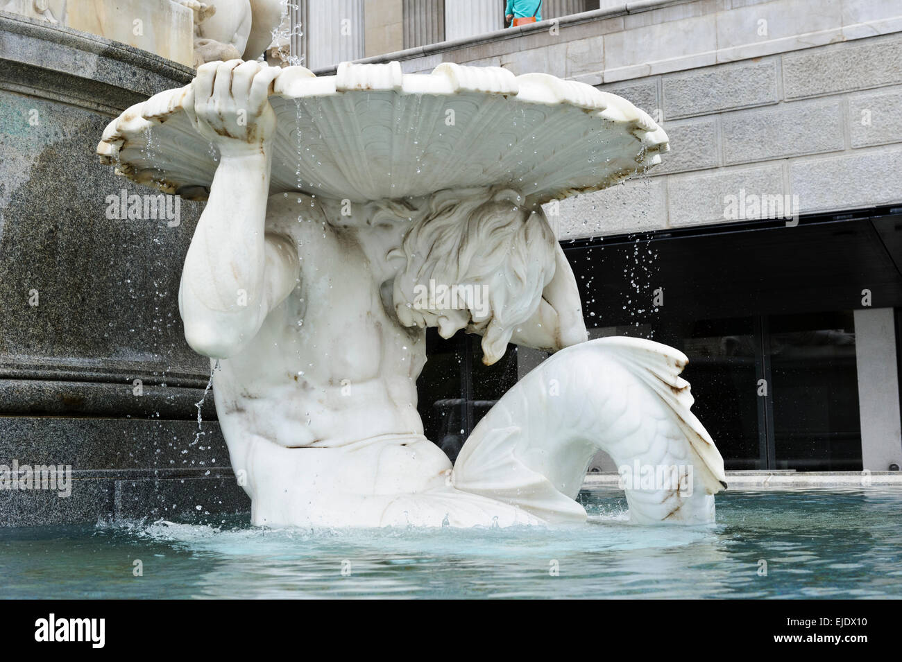 White marble sculpture from the Pallas Athena water fountain in front ...