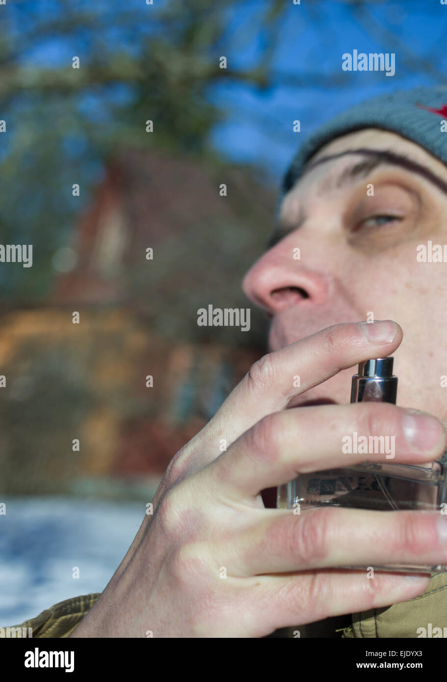 Man with a lotion Stock Photo - Alamy