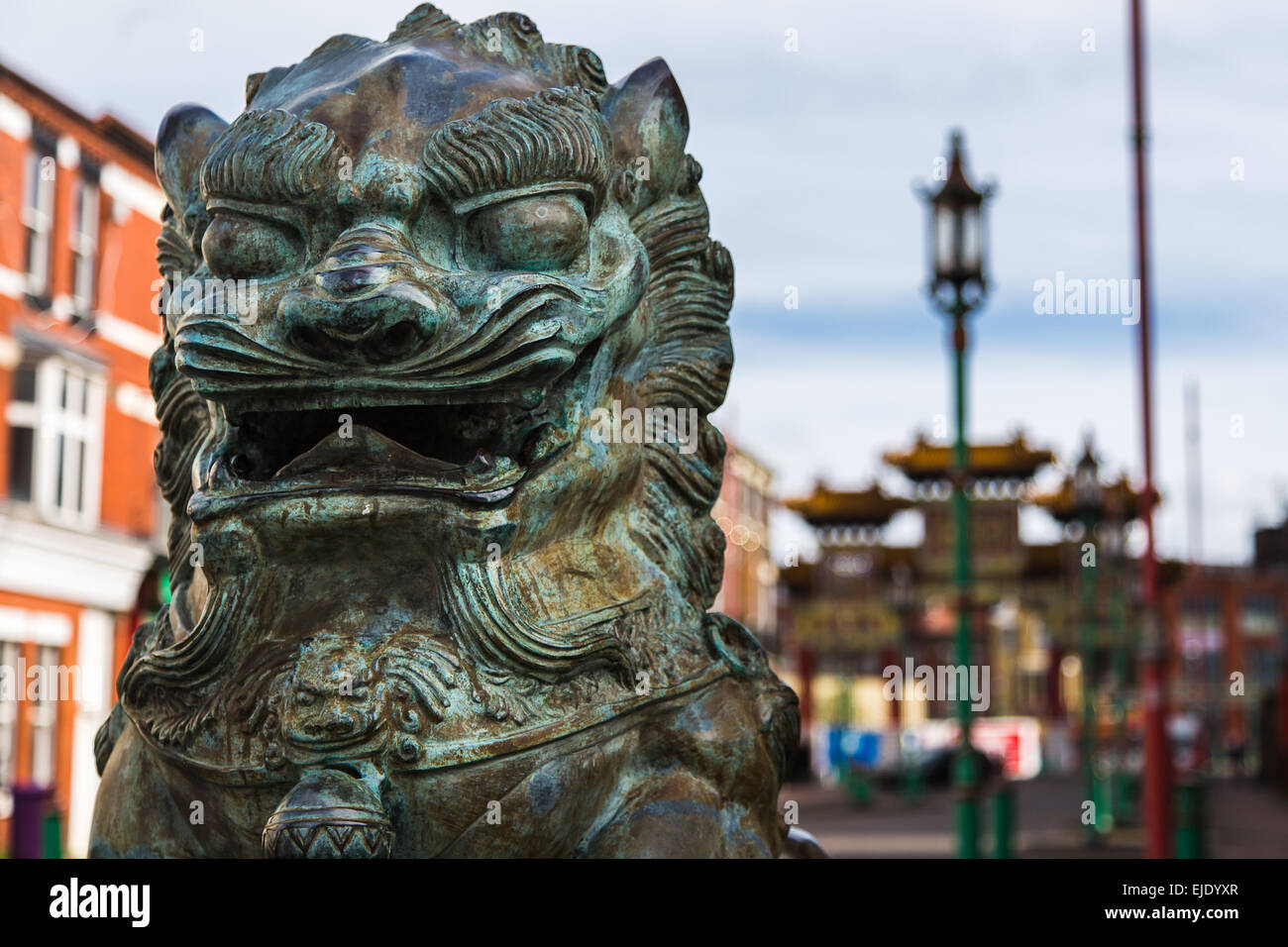 Lion statue at Liverpool's Chinatown Stock Photo - Alamy