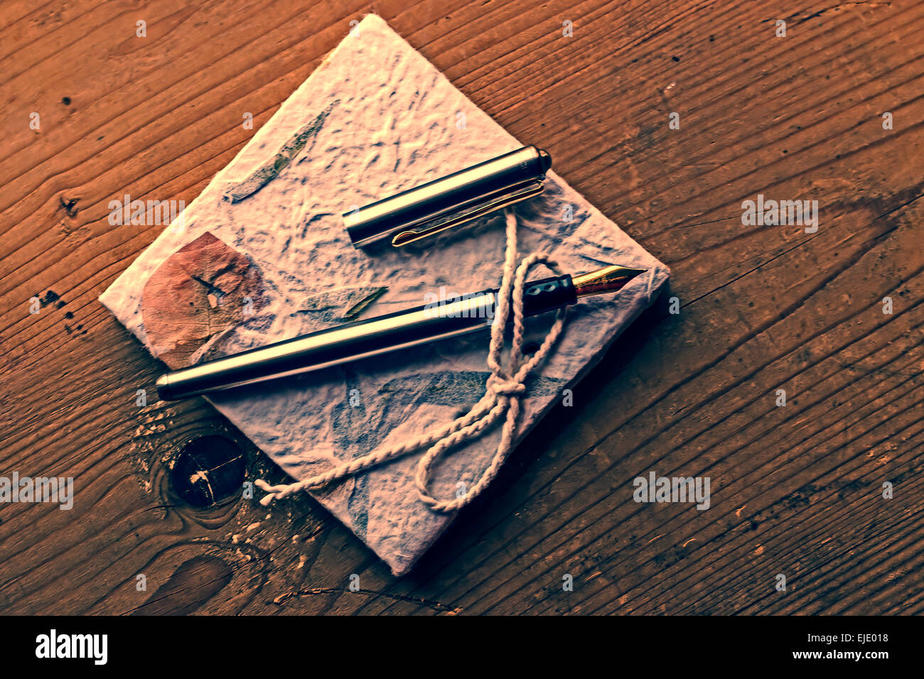 Old diary memories with fountain pen on a wooden table. Vintage ...