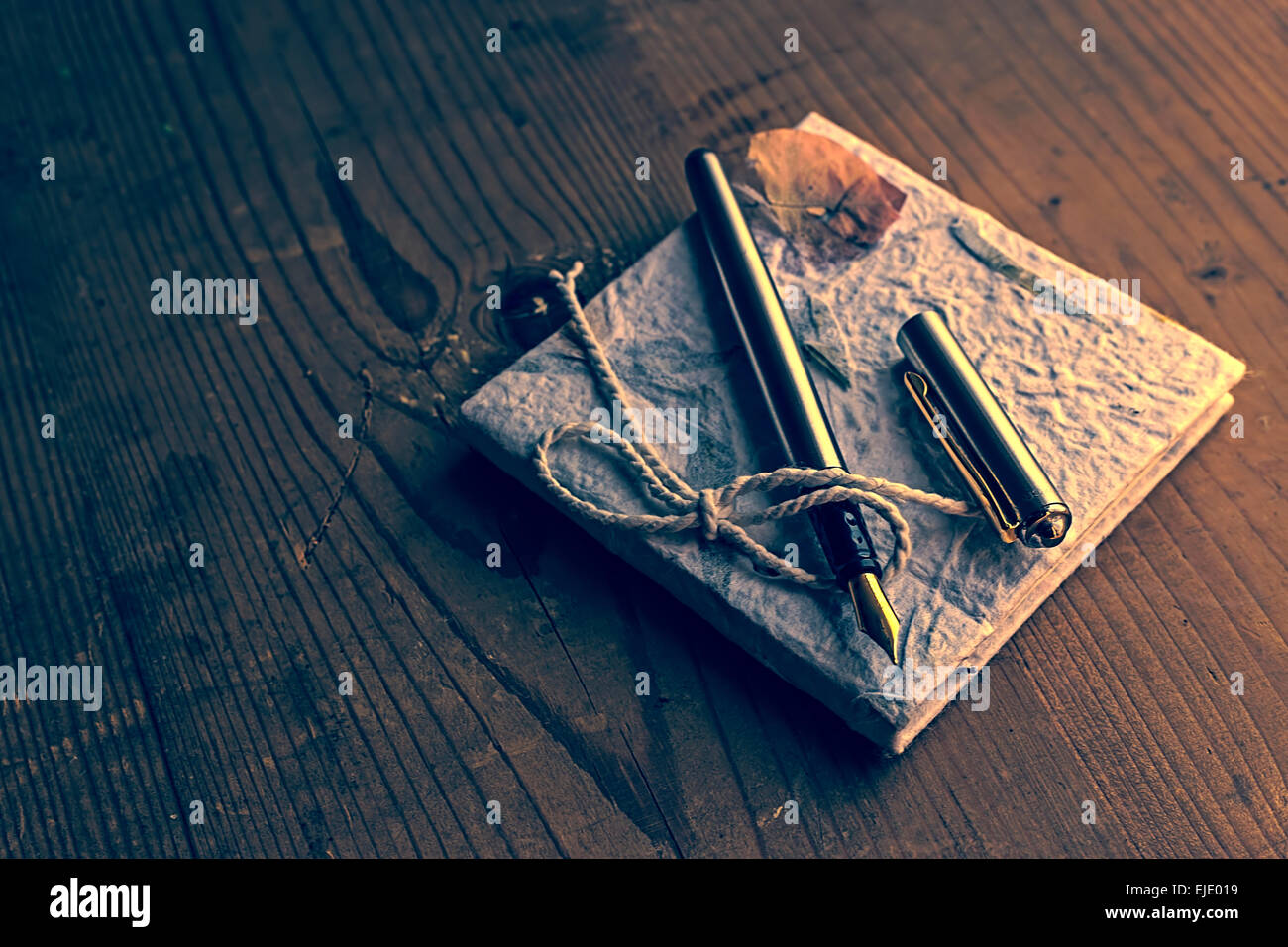 Old diary memories with fountain pen on a wooden table. Vintage ...