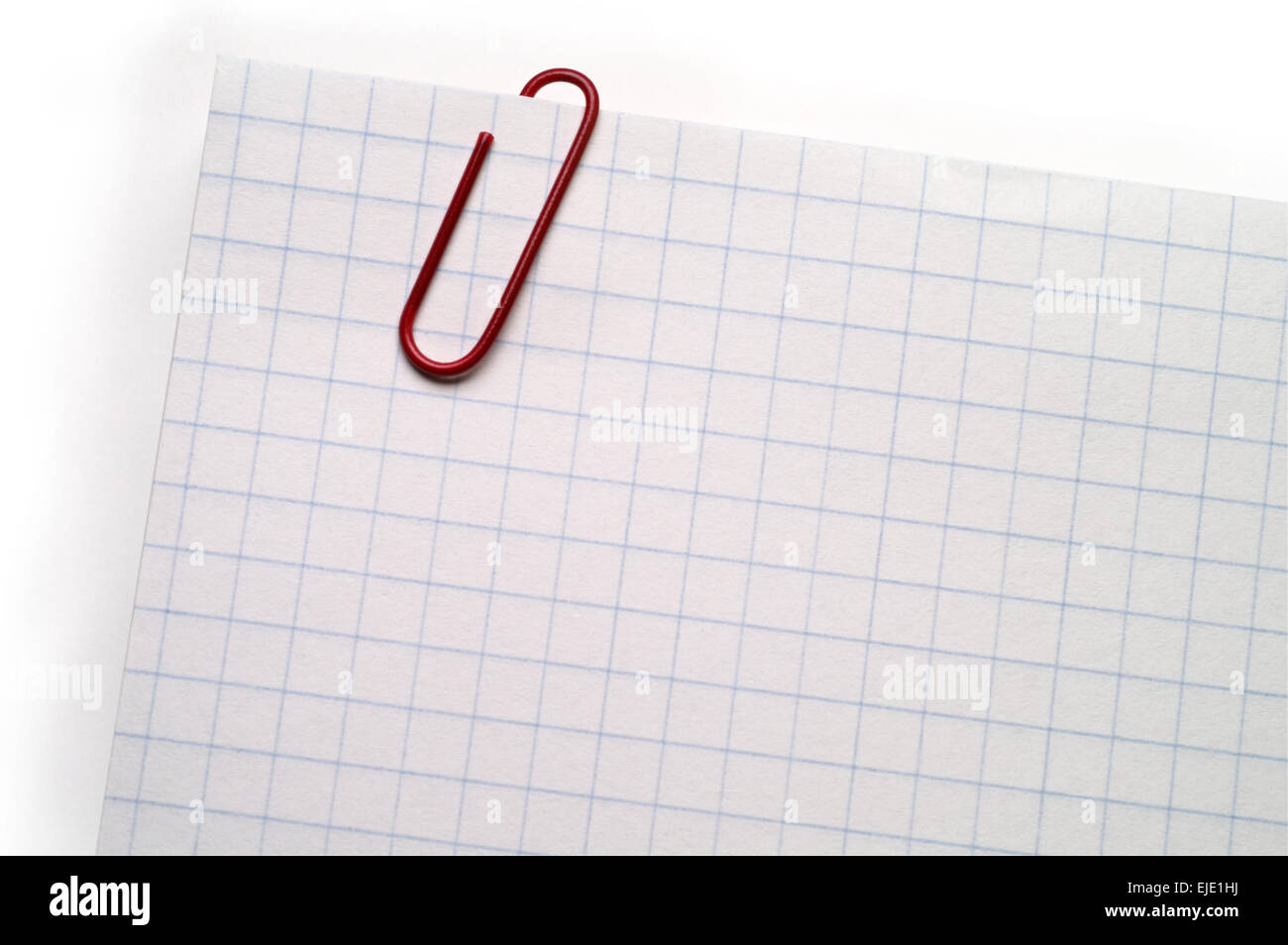 Note with red paper clip with clipping path Stock Photo - Alamy