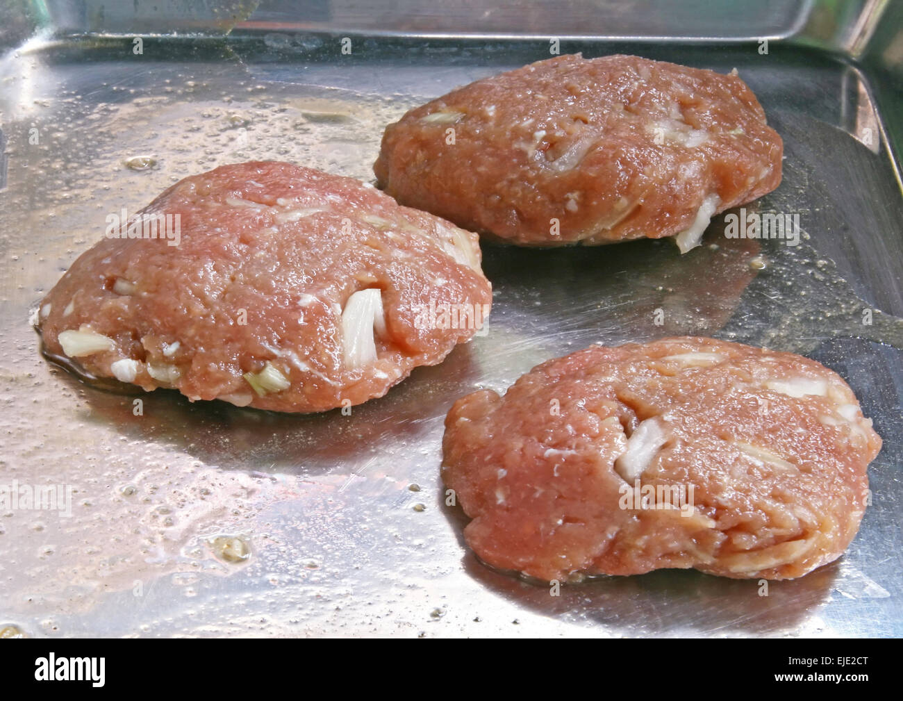 Raw Pork Hamberger with onion Stock Photo - Alamy