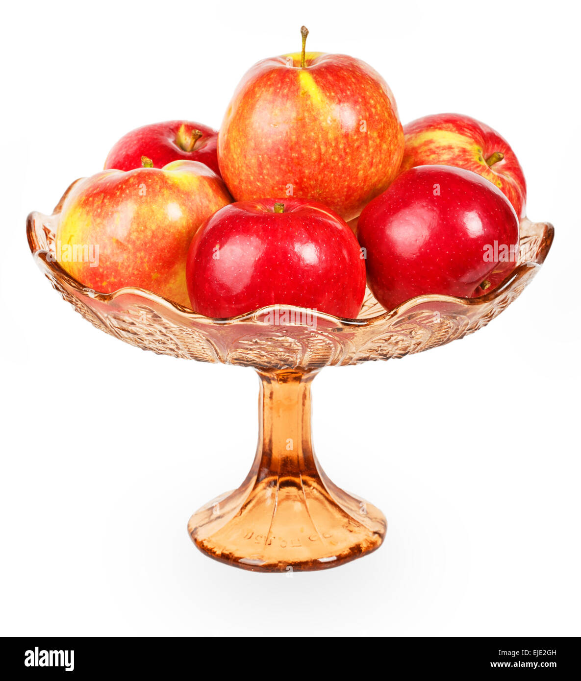 Red apples in a glass vase isolated on white background Stock Photo - Alamy