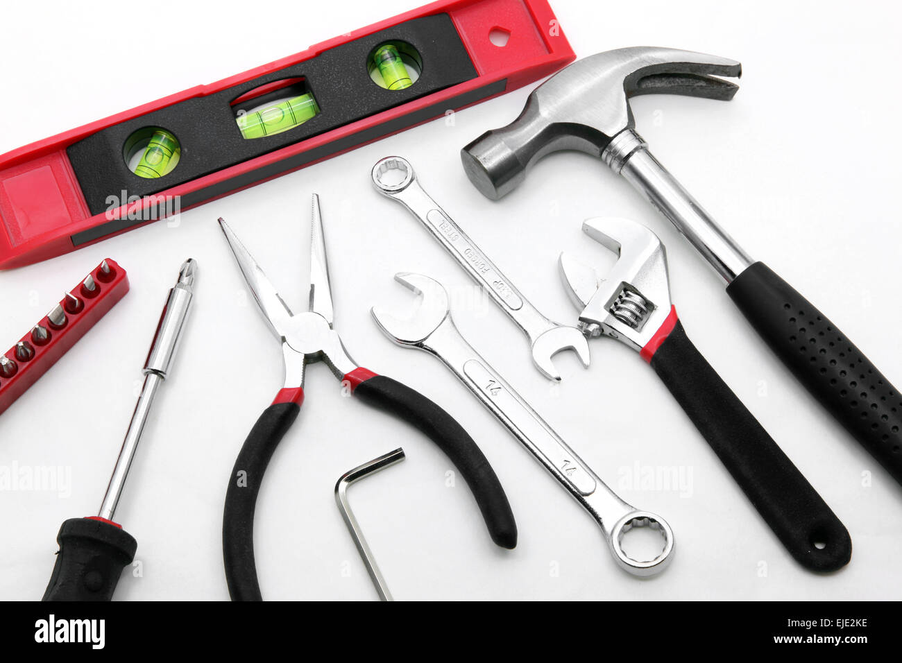 basic construction tool set on white background Stock Photo - Alamy
