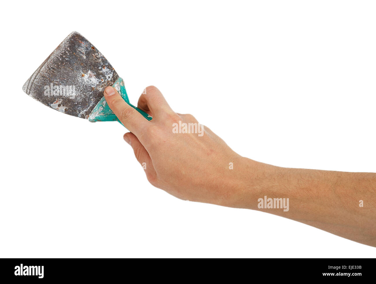 Old trowel in male hand isolated on white background Stock Photo - Alamy