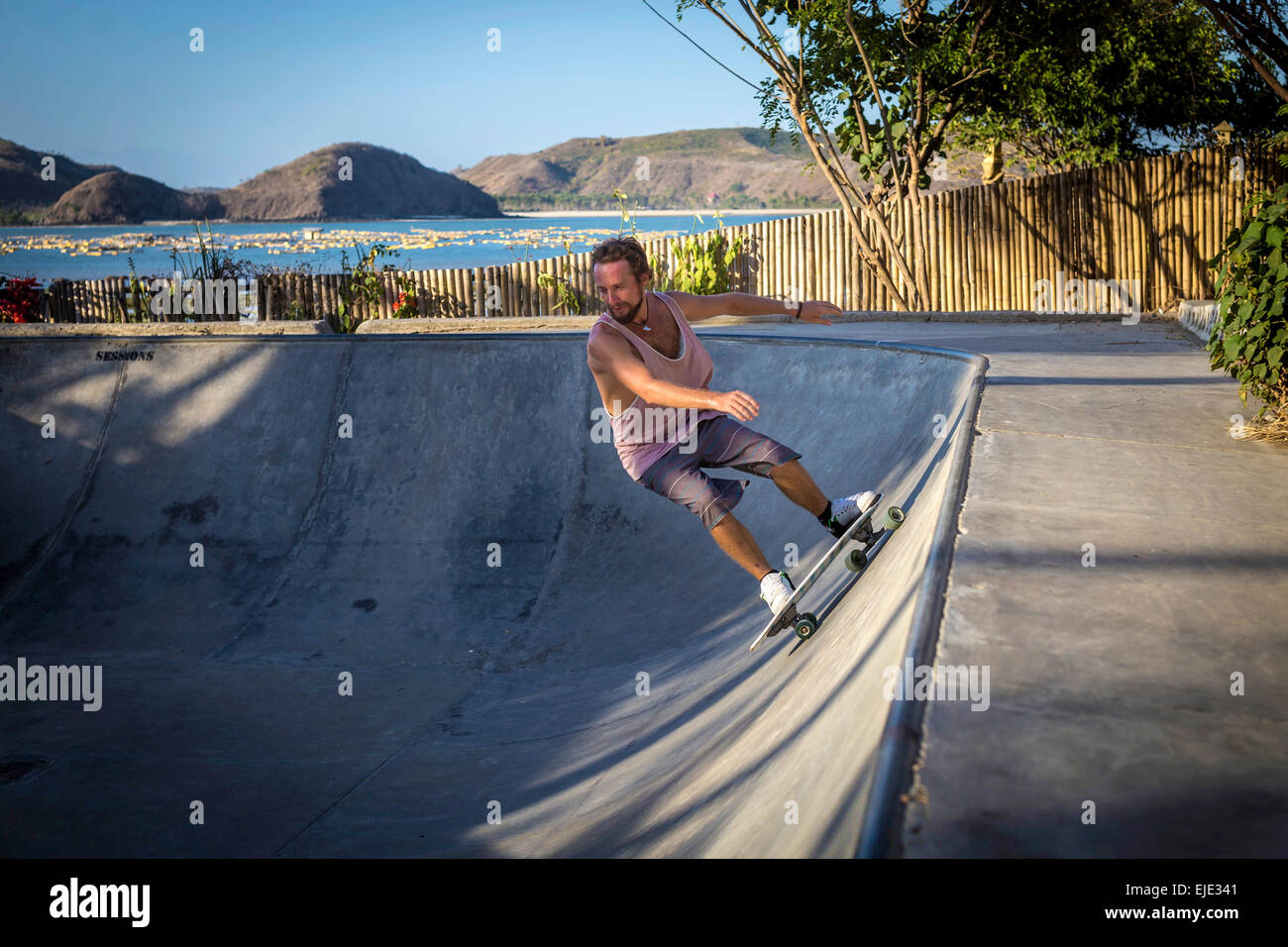 Surf skating in pool near the ocean Stock Photo - Alamy