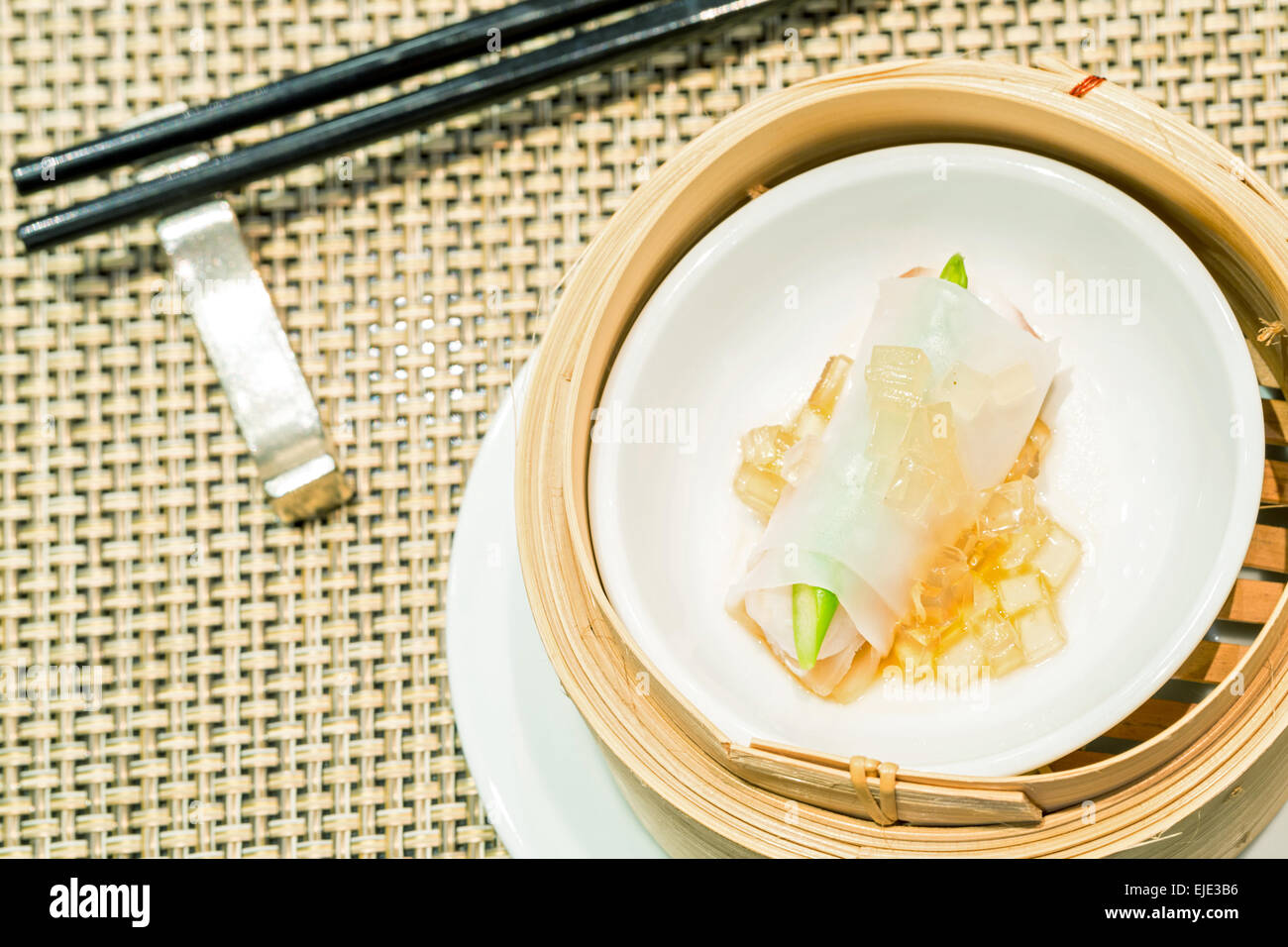 Chinese Steamed red grouper with asparagus dumplings dimsum in bamboo ...