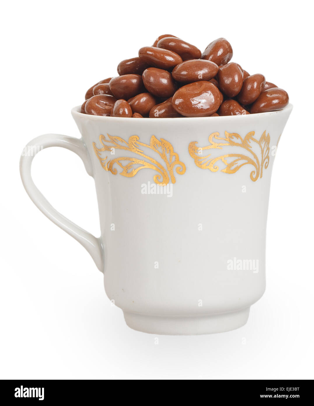 Chocolate dragees in a cup isolated on white background Stock Photo - Alamy