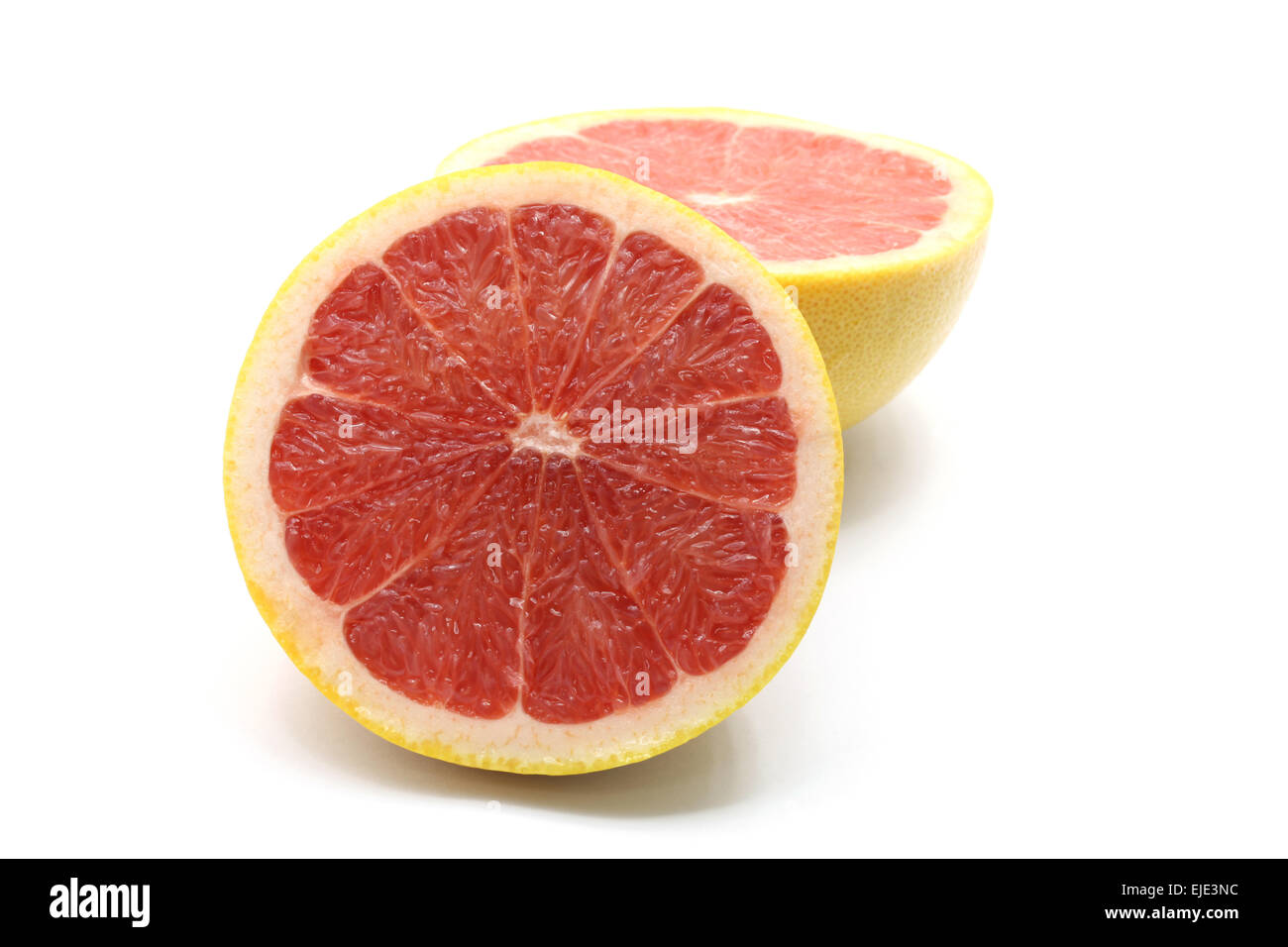 cross section of Fresh juicy grapefruits isolated on white background ...