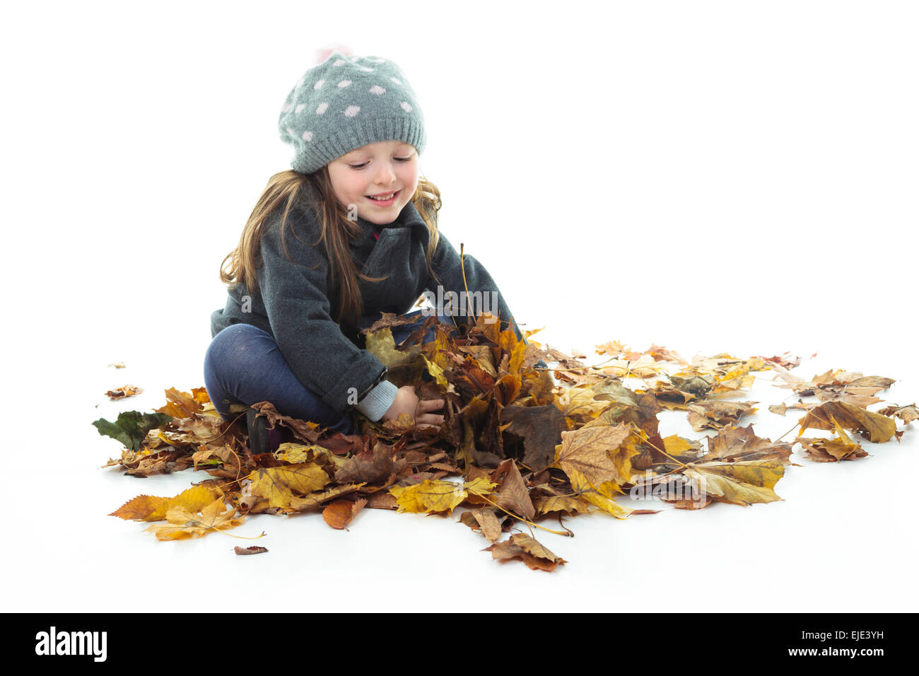 A happy autumn girl on studio white background Stock Photo - Alamy