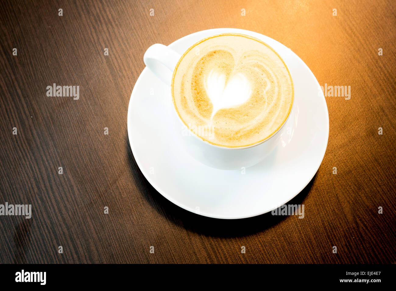 Cup of latte coffee with heart symbol Stock Photo - Alamy