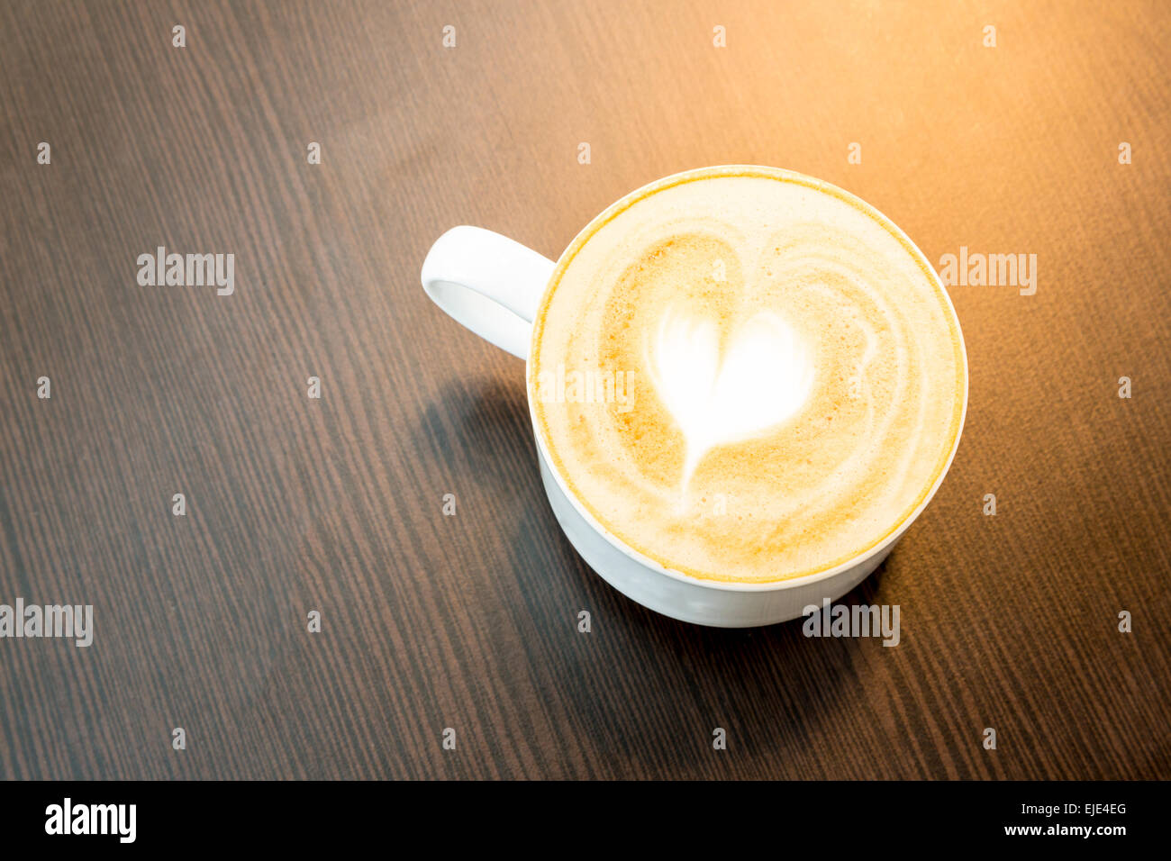 Cup of latte coffee with heart symbol Stock Photo - Alamy