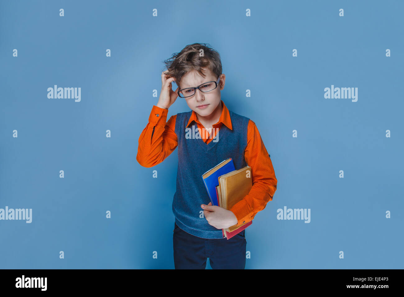 A boy intently reading a book hi-res stock photography and images - Alamy