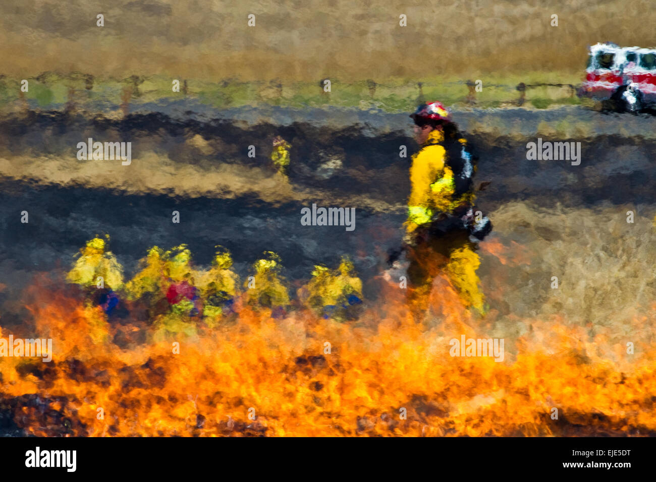 Firefighter Fighting Fire Stock Photo - Alamy
