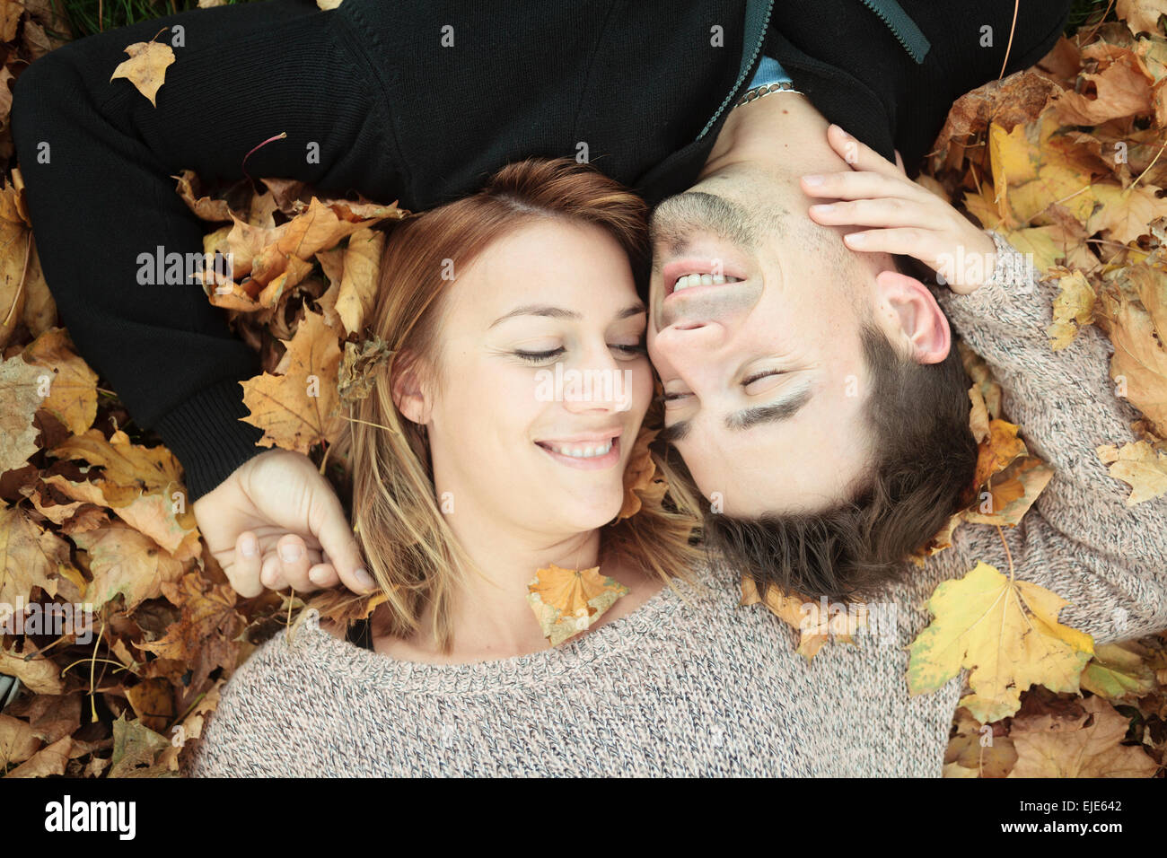 Young happy couple in autumn season Stock Photo - Alamy
