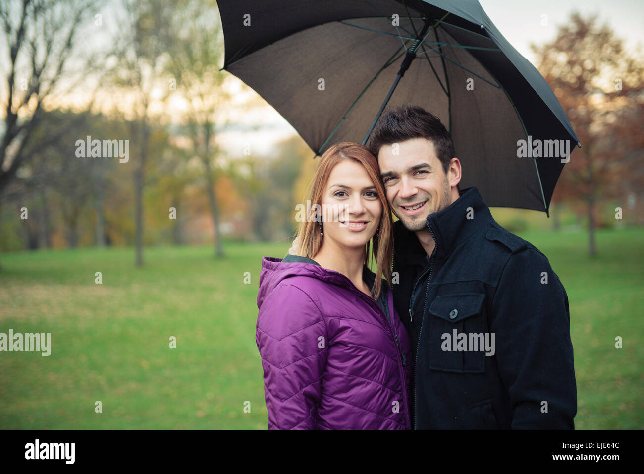 Young happy couple in autumn season Stock Photo - Alamy
