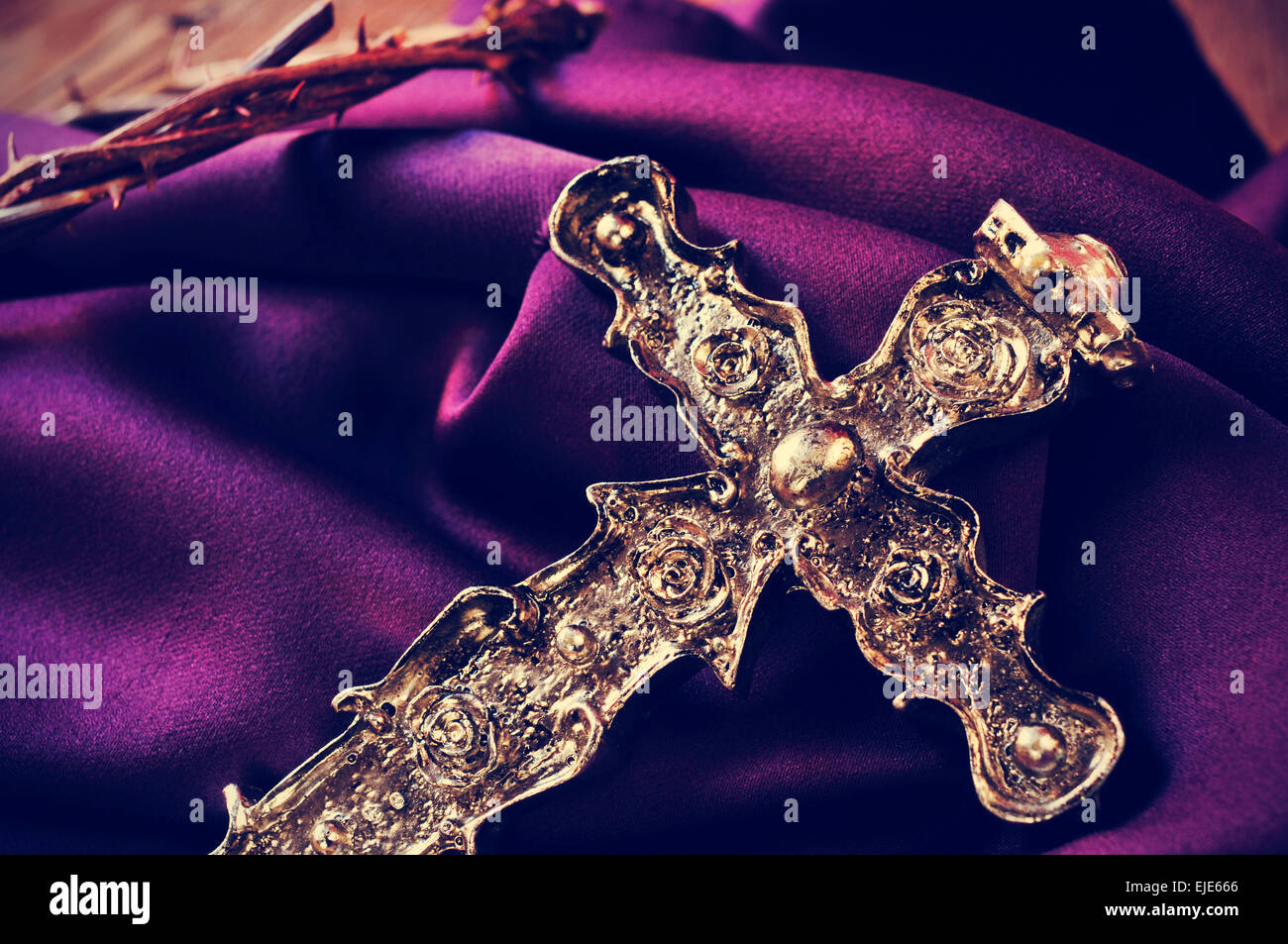 Cross with purple cloth hi-res stock photography and images - Alamy