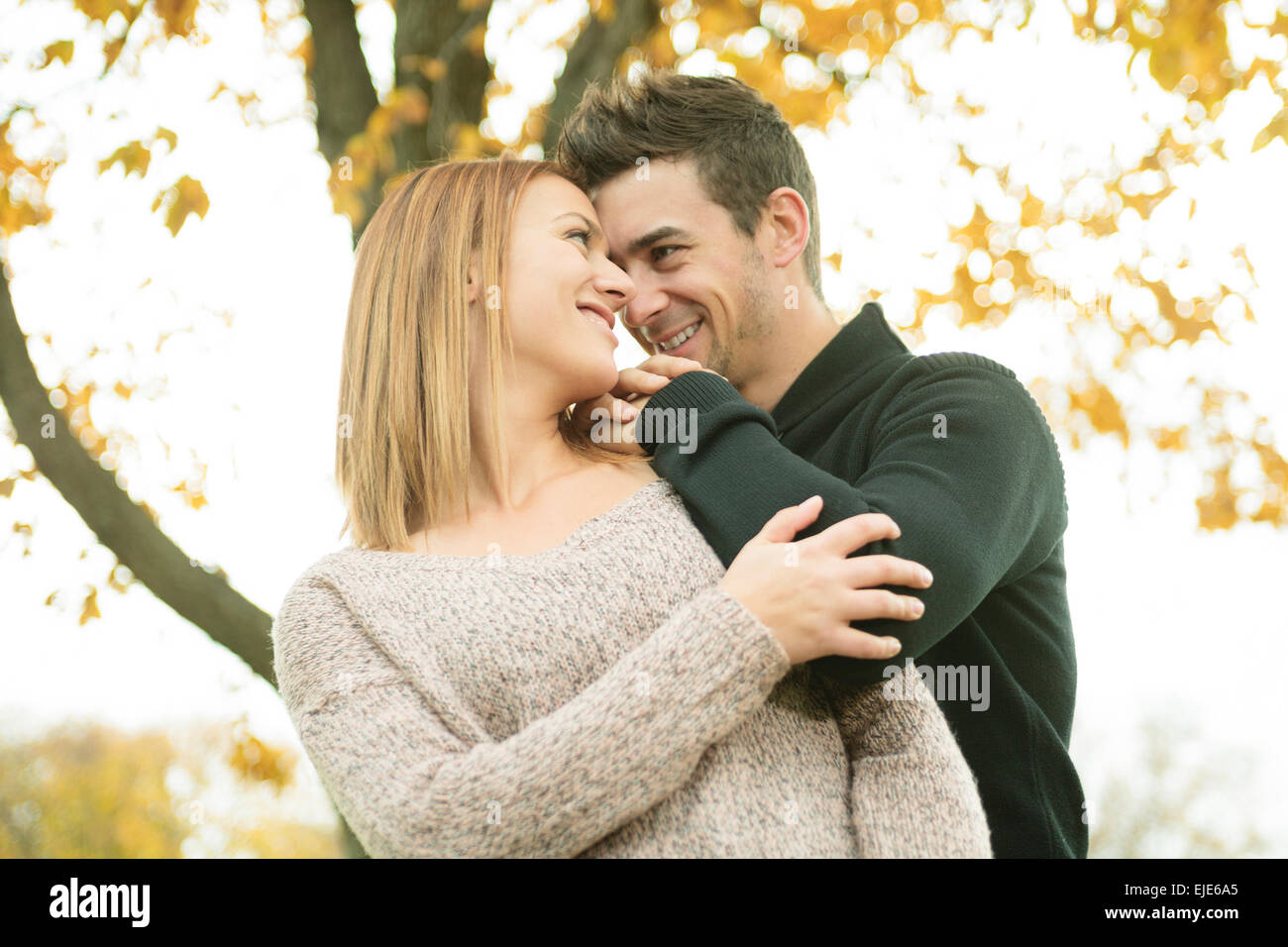 Young happy couple in autumn season Stock Photo - Alamy