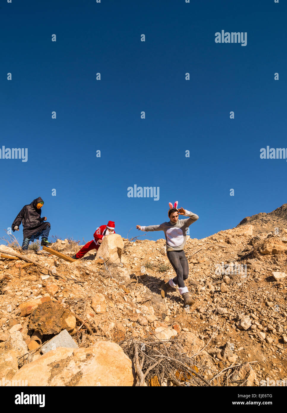 Santa and the Halloween monster ambushing the Easter Bunny Stock Photo ...
