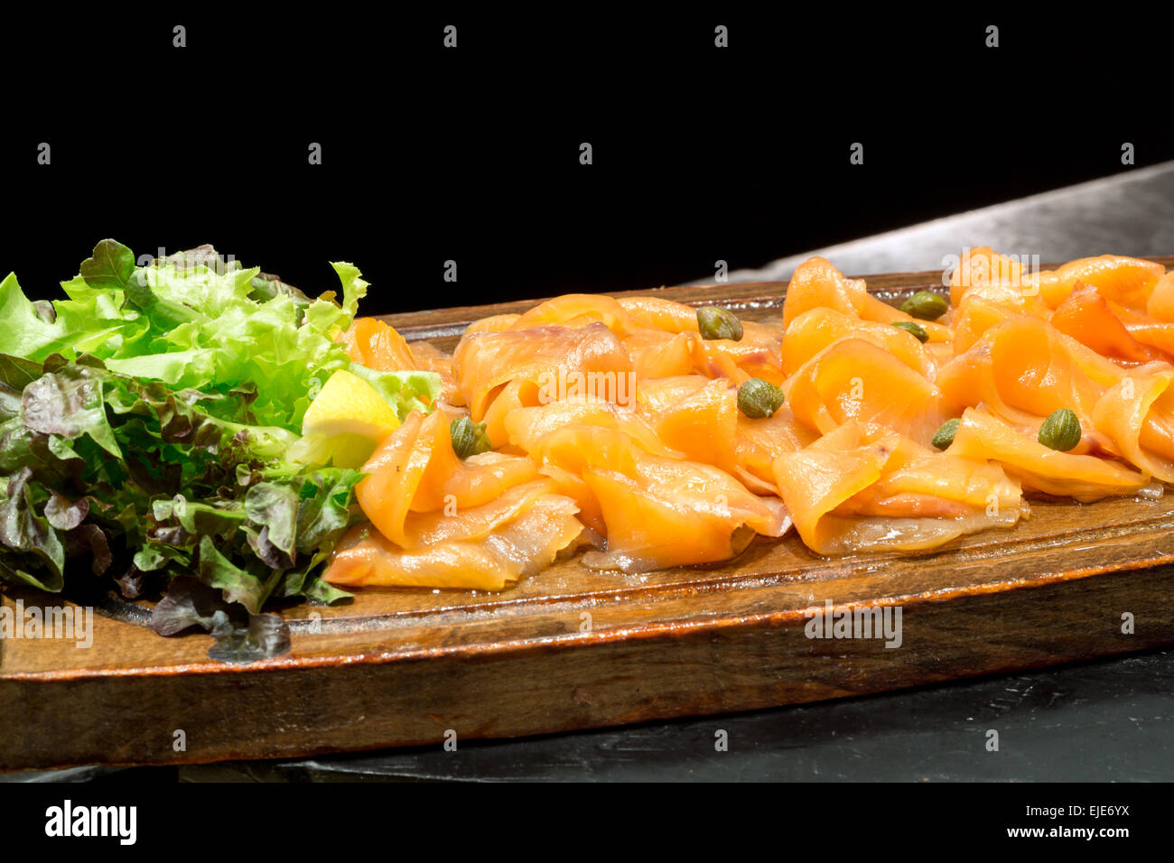 smoke salmon sashimi with lettuce Stock Photo - Alamy