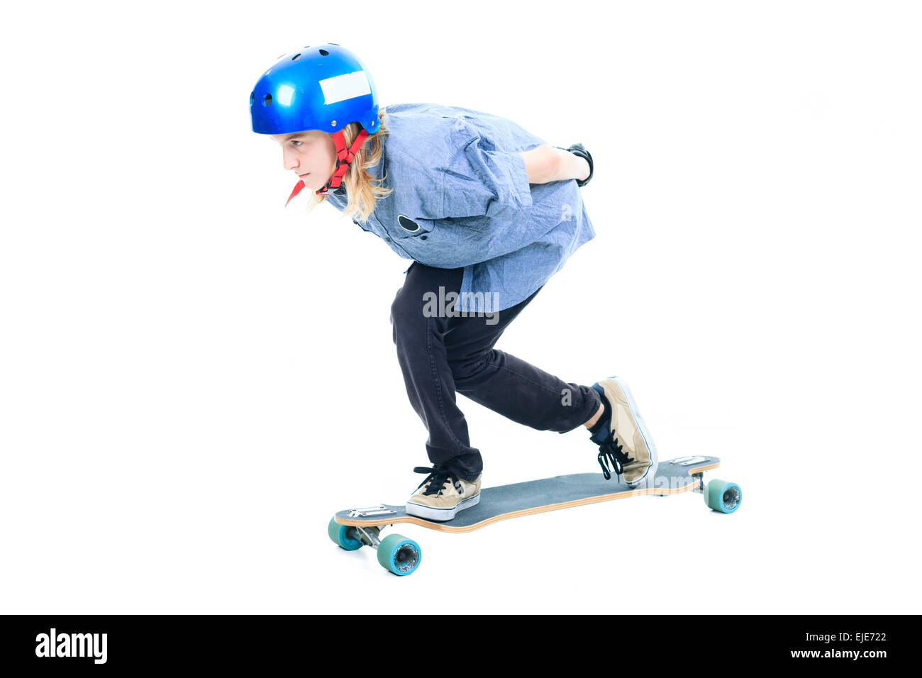 A Happy man with longboard in studio Stock Photo - Alamy