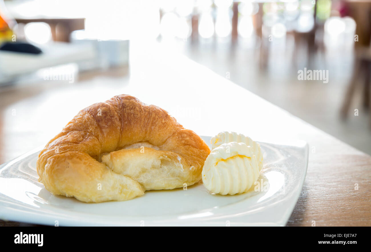 croissant and butter in dish Stock Photo - Alamy