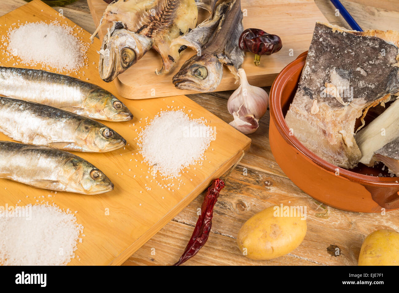 Assorted salt cured fish with ingredients for Mediterranean recipies ...